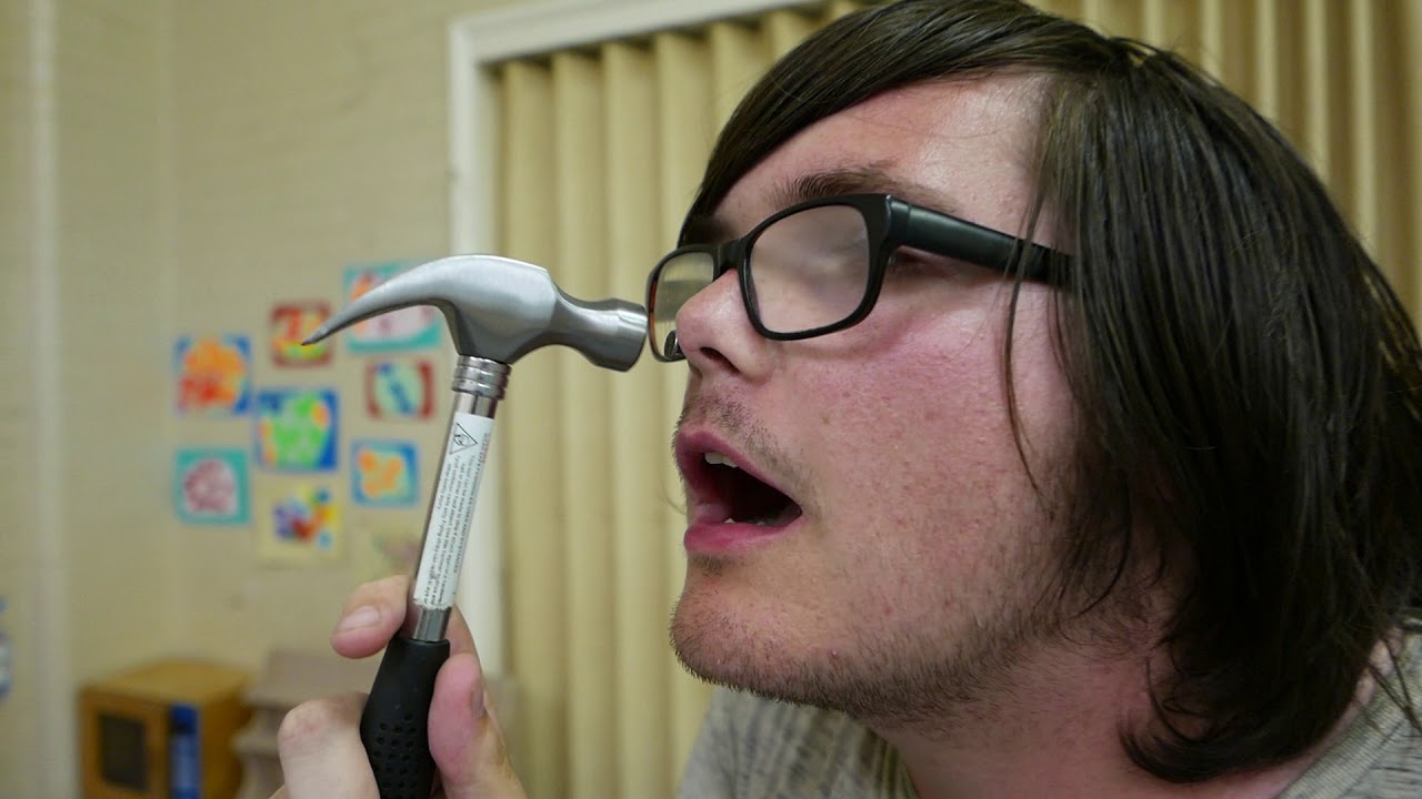 Human blockhead (hammer a nail in my face) - YouTube
