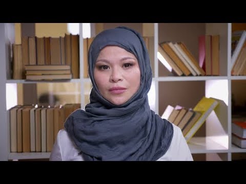 Adult Muslim Businesswoman Looking At Camera Standing In The Library On The Workplace | Motion