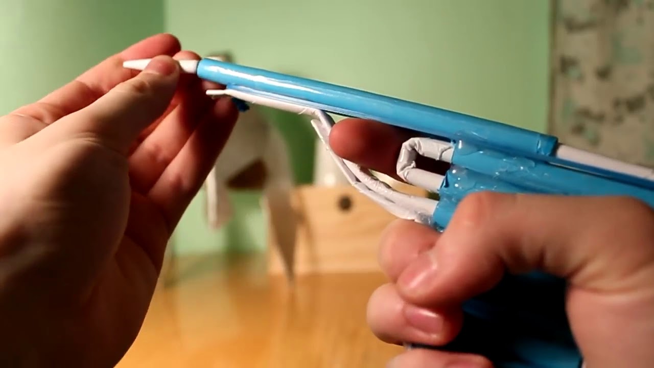 How to make a Paper Gun that Shoots - With Trigger - YouTube