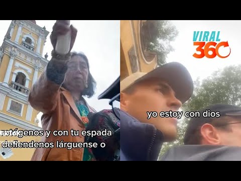 Mujer rocía con agua bendita a pareja gay que se abrazaba afuera de una iglesia