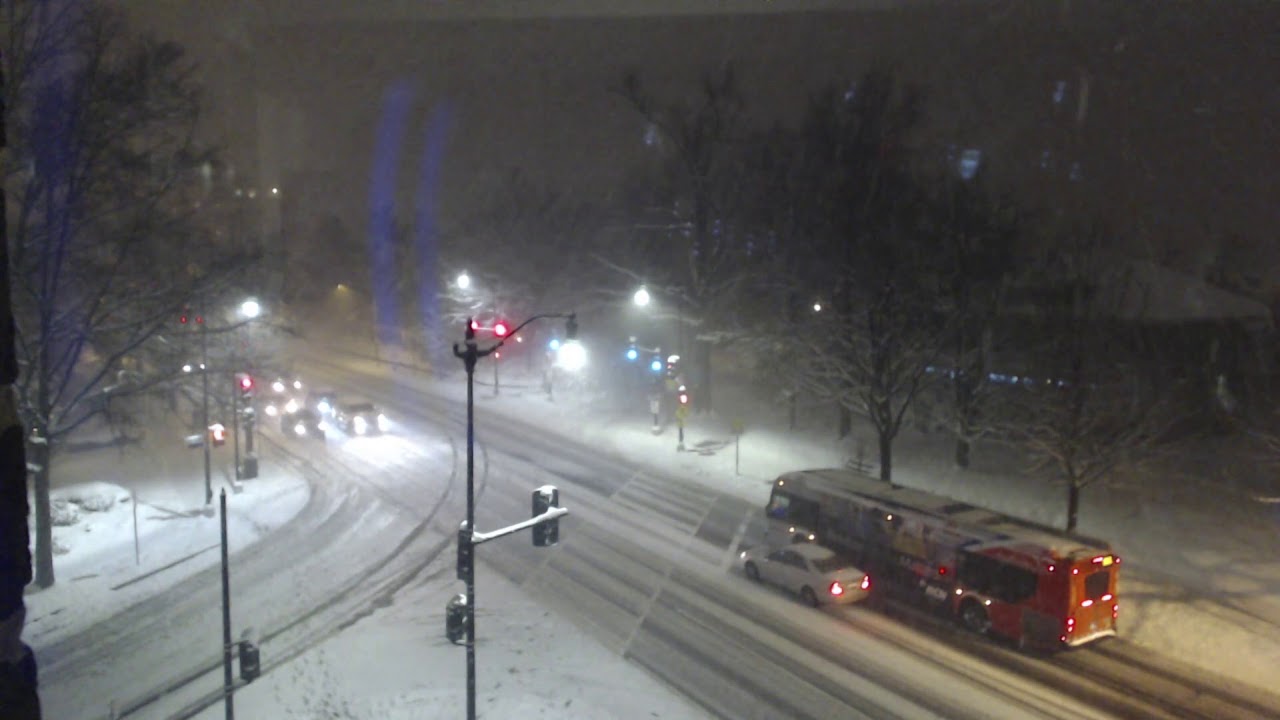 Falling snow over Washington DC outside my window. - YouTube