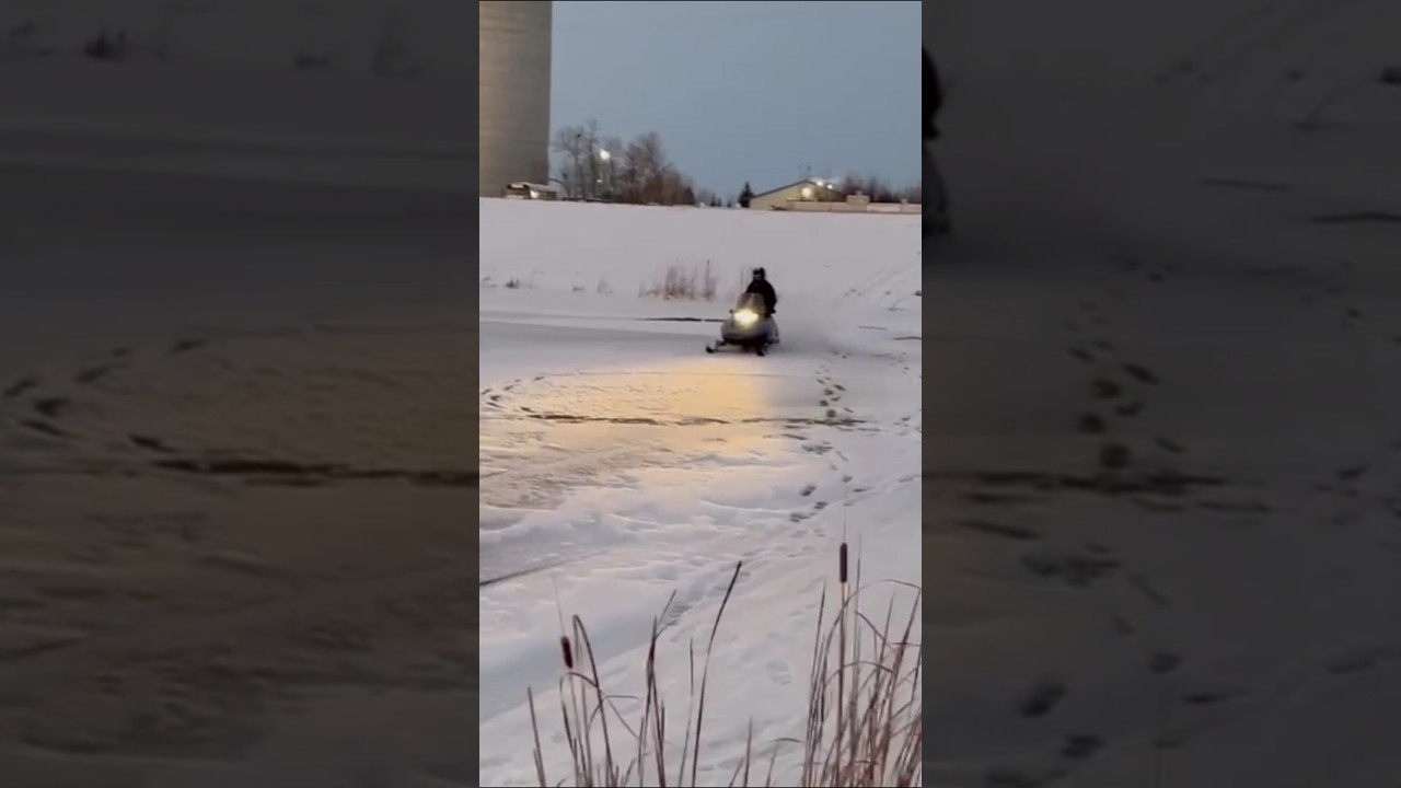 Snowmobile almost falls through ice... #snowmobile #thinice #shorts # ...