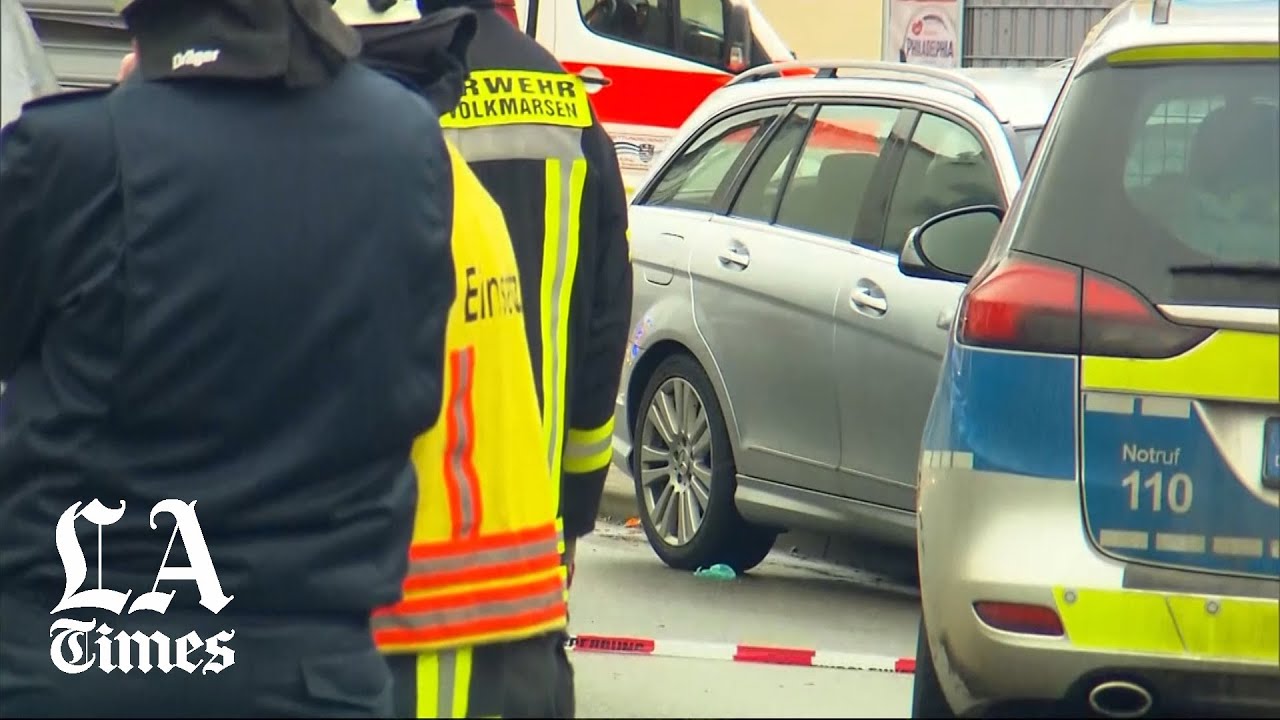Car hits crowd at Carnival parade in German town - YouTube