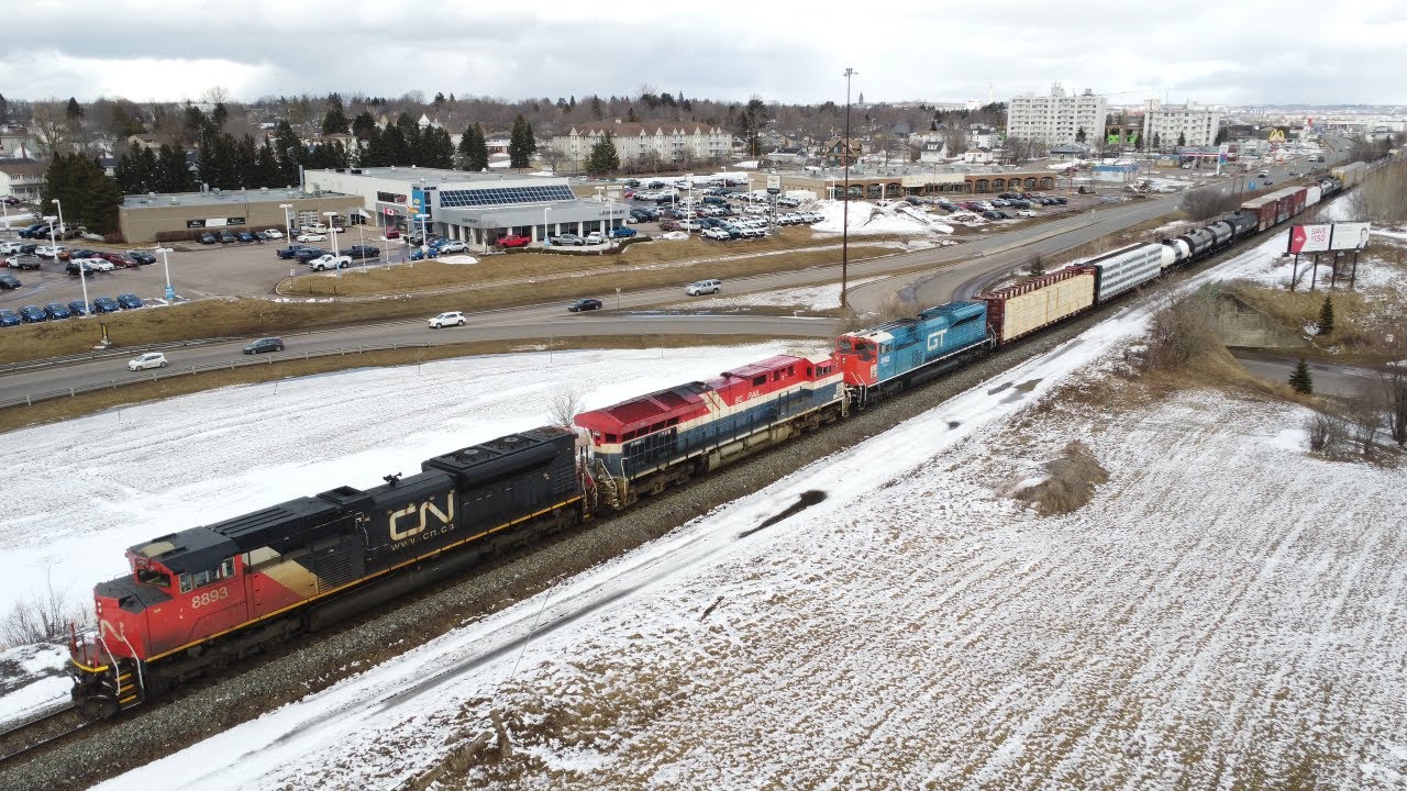 Awesome Aerial 4K View! BC Rail & Grand Trunk Heritage Units on Manifest Train CN 507 at Moncton ...