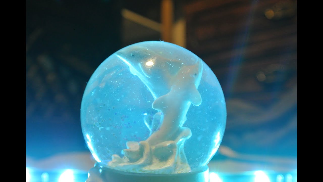 Blue light dolphin liquid crystal ball - YouTube