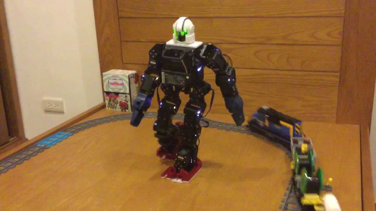 Giant robot walks in Lego city - YouTube