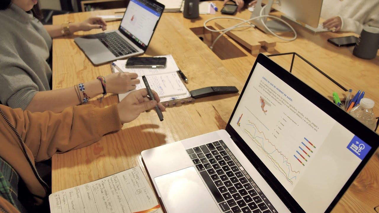 People working with Macbook on a wooden table | Free stock Apple video ...