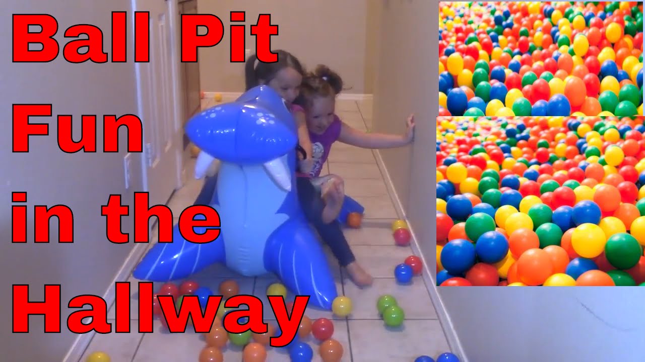 Ball Pit Fun in our House! Silly sisters ride up and down the hallway ...