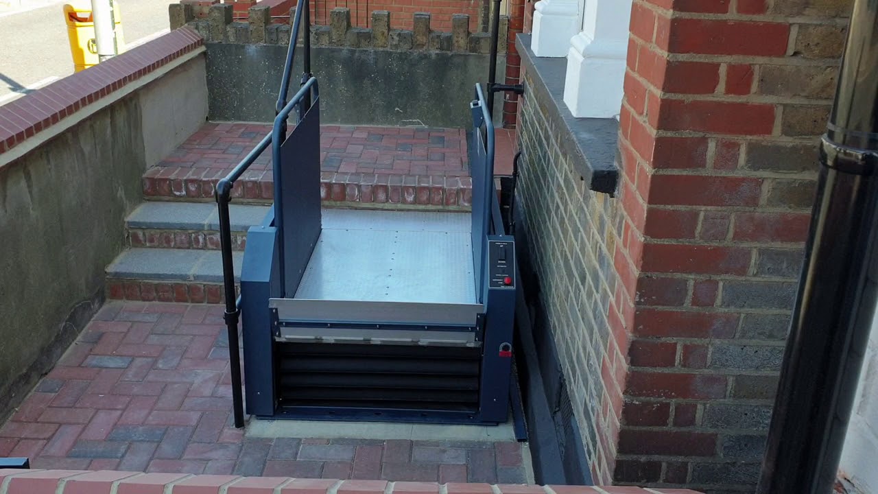 Wessex SP500 step lift with bridging step. - YouTube