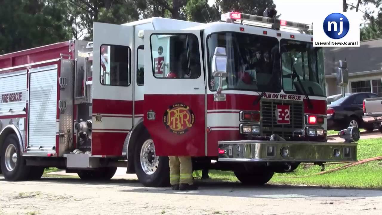 Firefighters rescue woman from Palm Bay house fire - YouTube