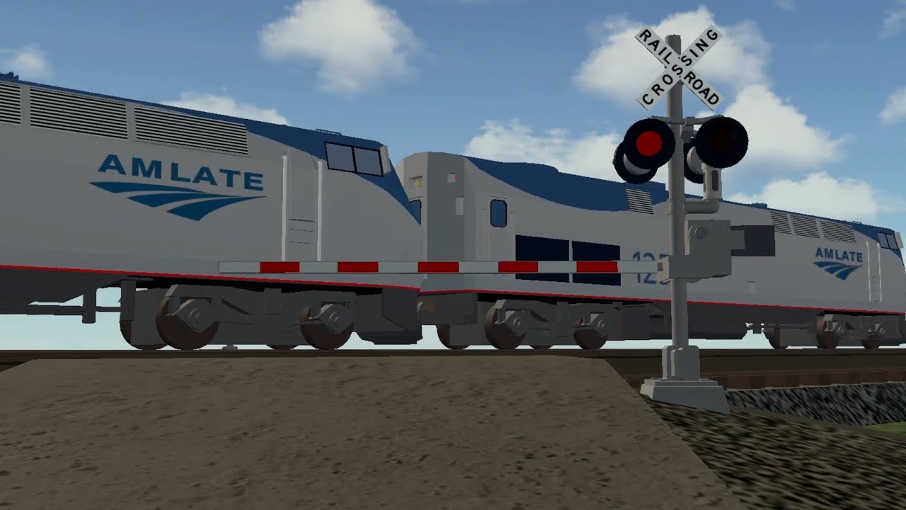 Amtrak 125 Leads Sliver Star East | Rd Railroad Crossing - YouTube