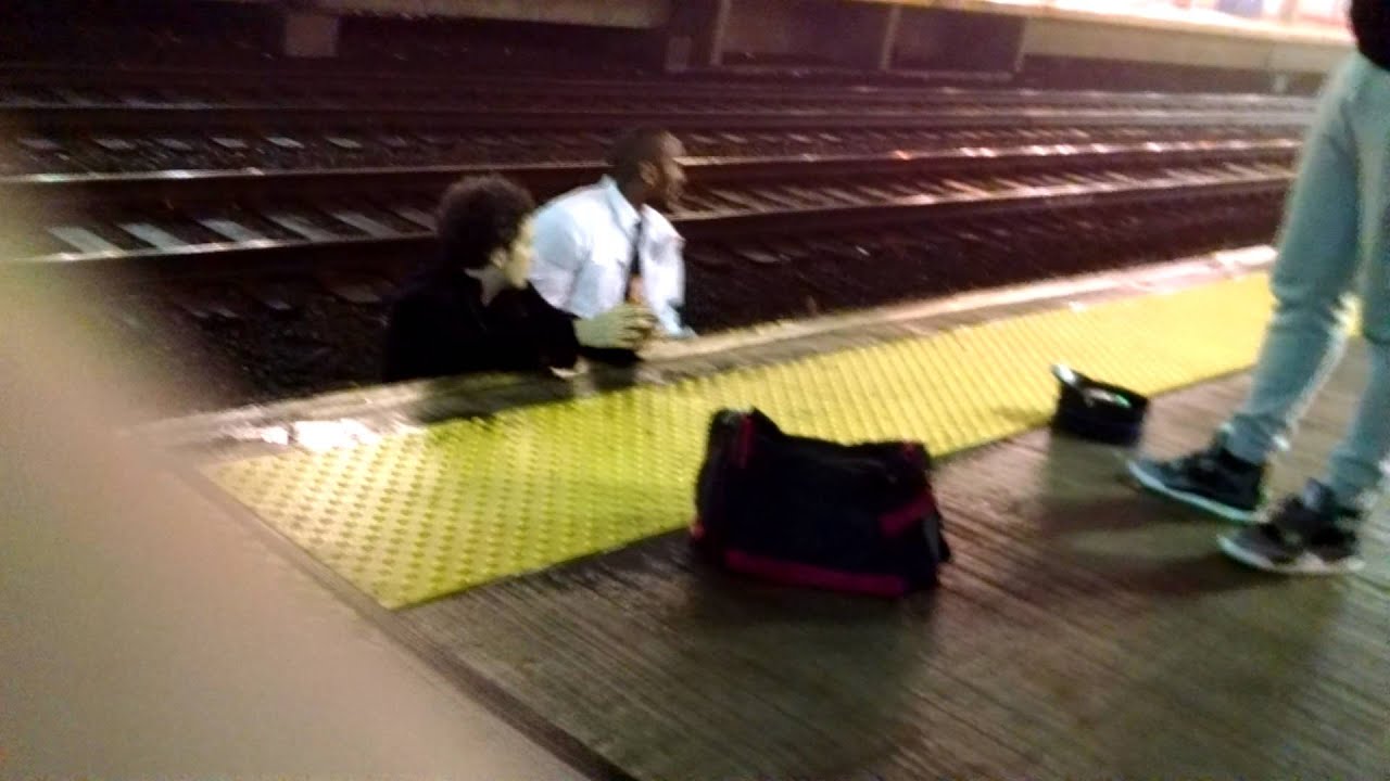 Woops, guy fell on tracks, train able to stop in time! - YouTube