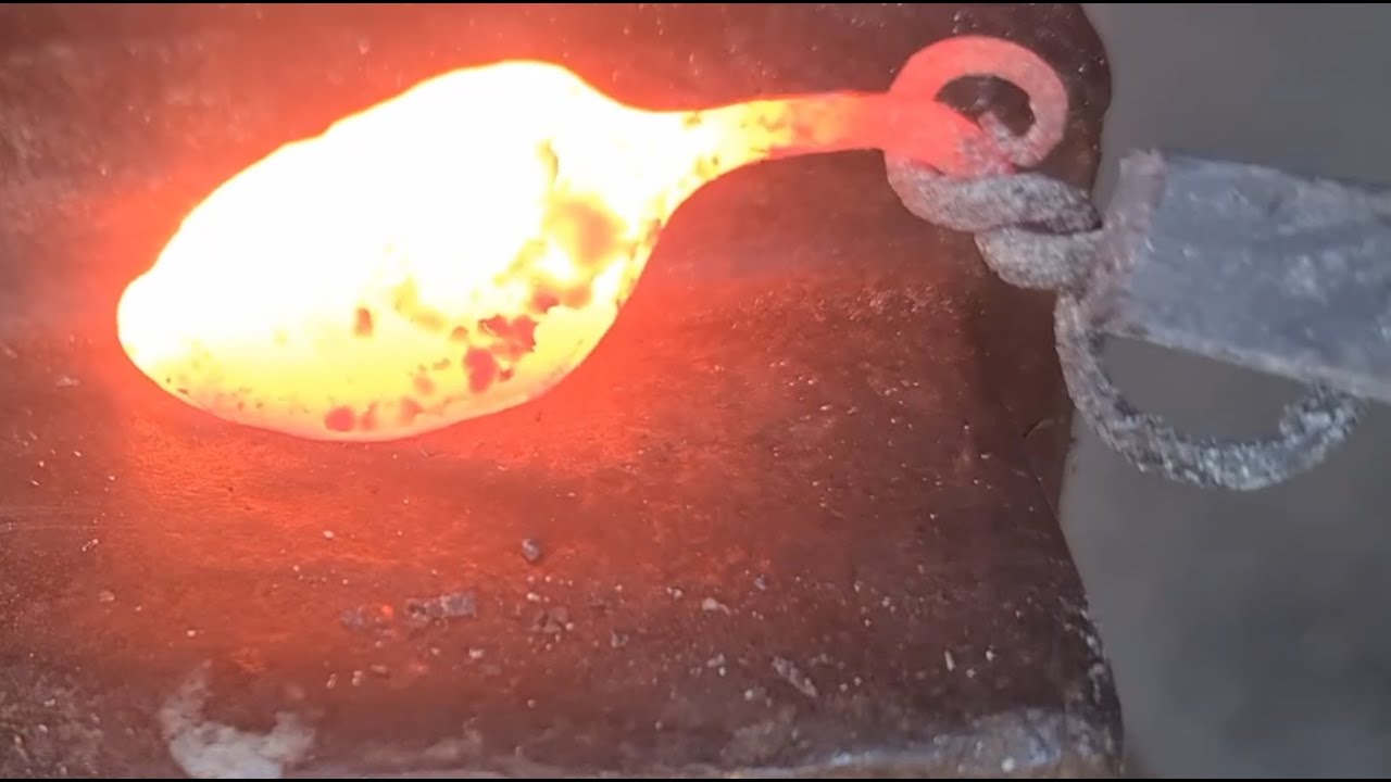 Forging a leaf out of steel - YouTube