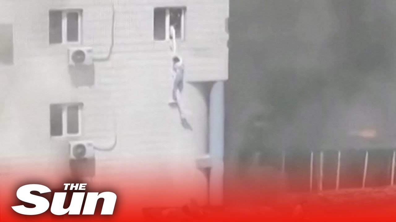 People desperately climb from windows to escape huge hospital fire in ...