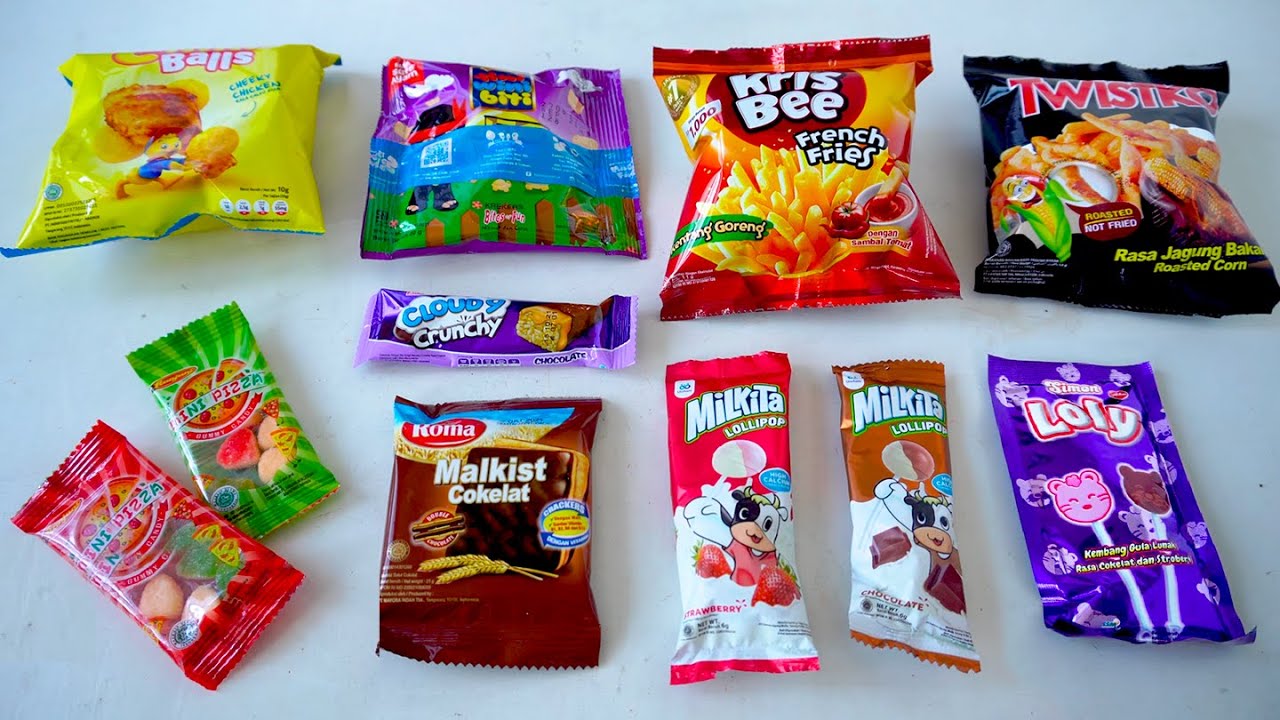 Some lots of Candies, Milkita Lollipop pizza Malkist Chiki balls ...