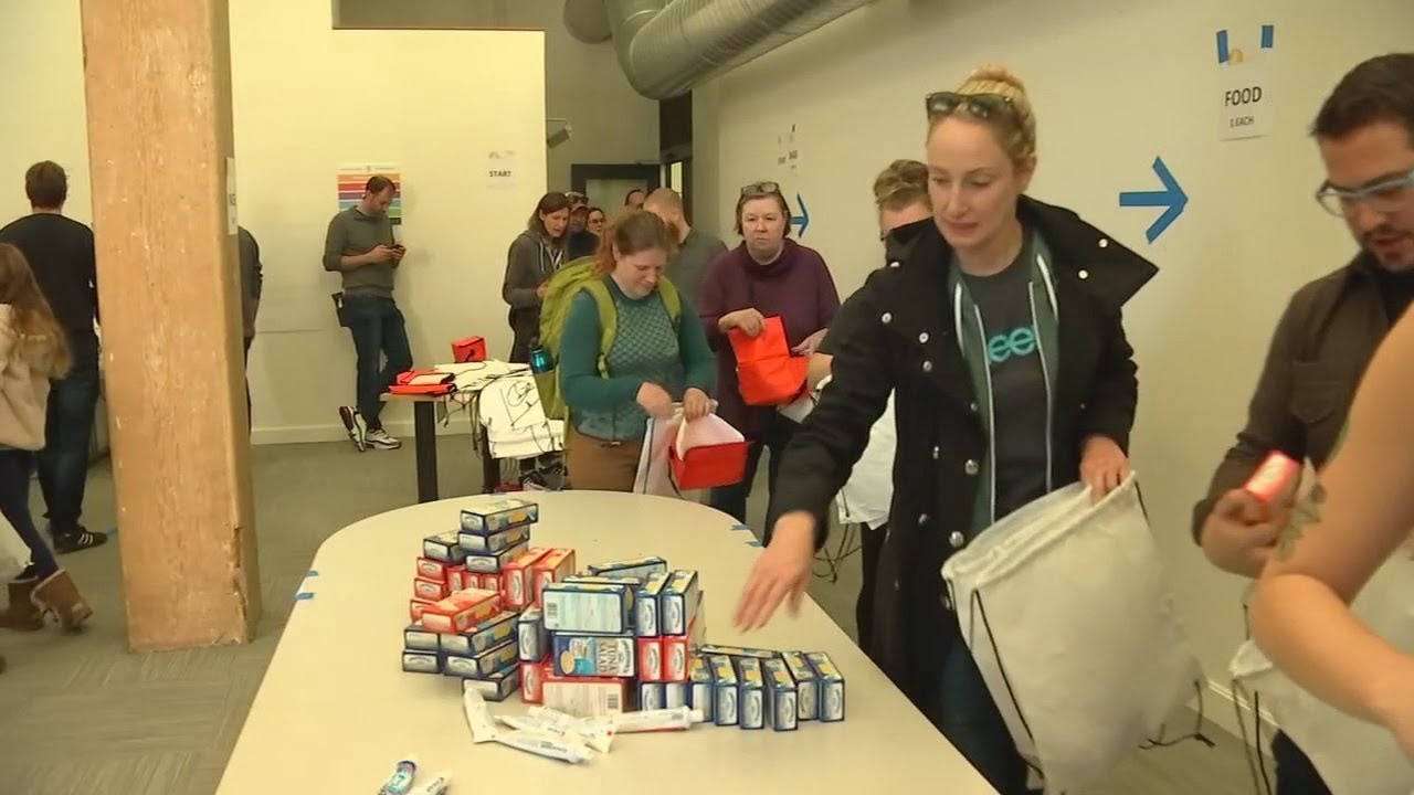 Volunteers pack up, give out 400 kits for veterans and others on ...