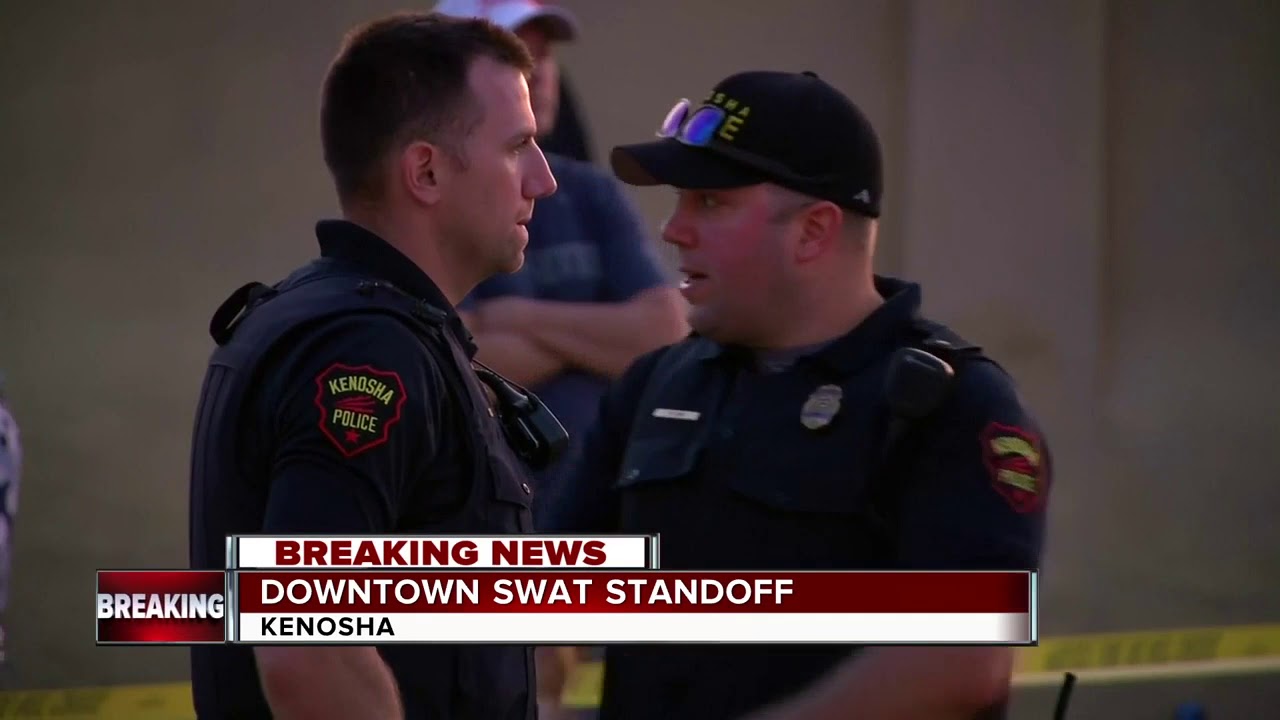 Dozens watch police stand off in Kenosha - YouTube
