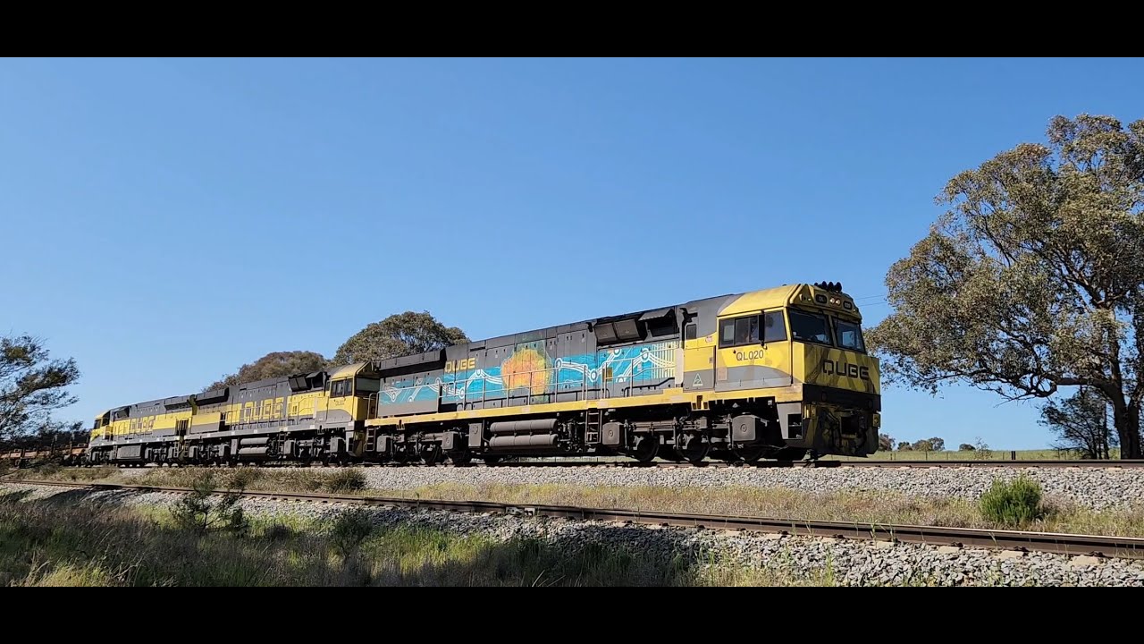 South-bound loaded Steel train with locos QL020, QL002 & QL010 at Junee ...