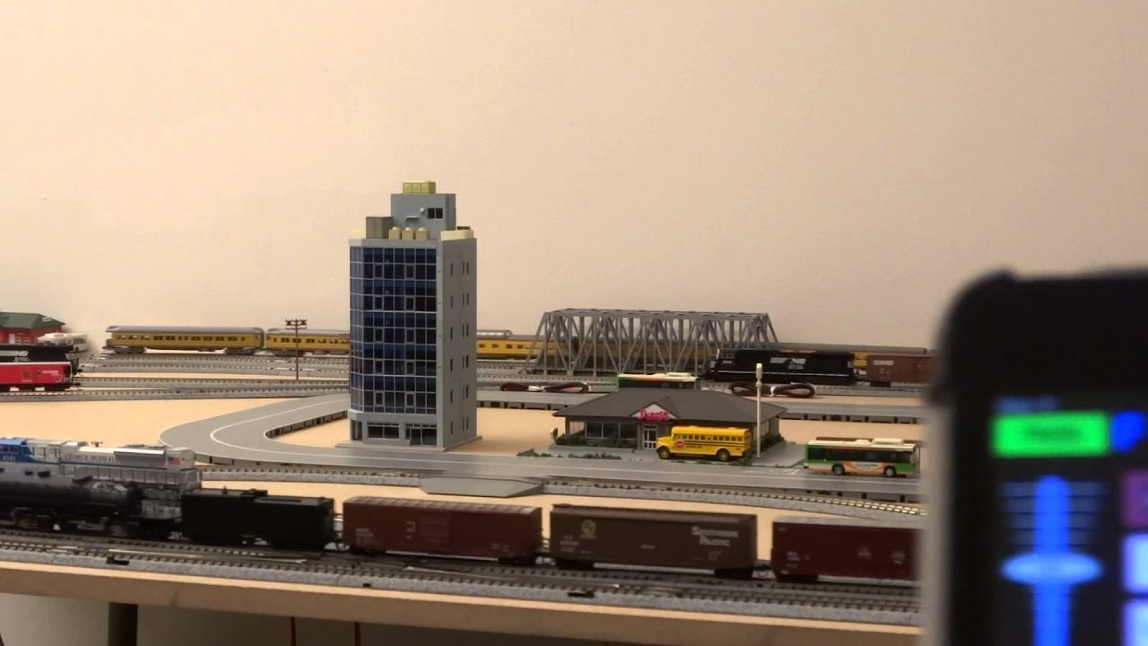 N scale layout with DCC Sound, moving buses, UP Turbine, Cab Forward ...