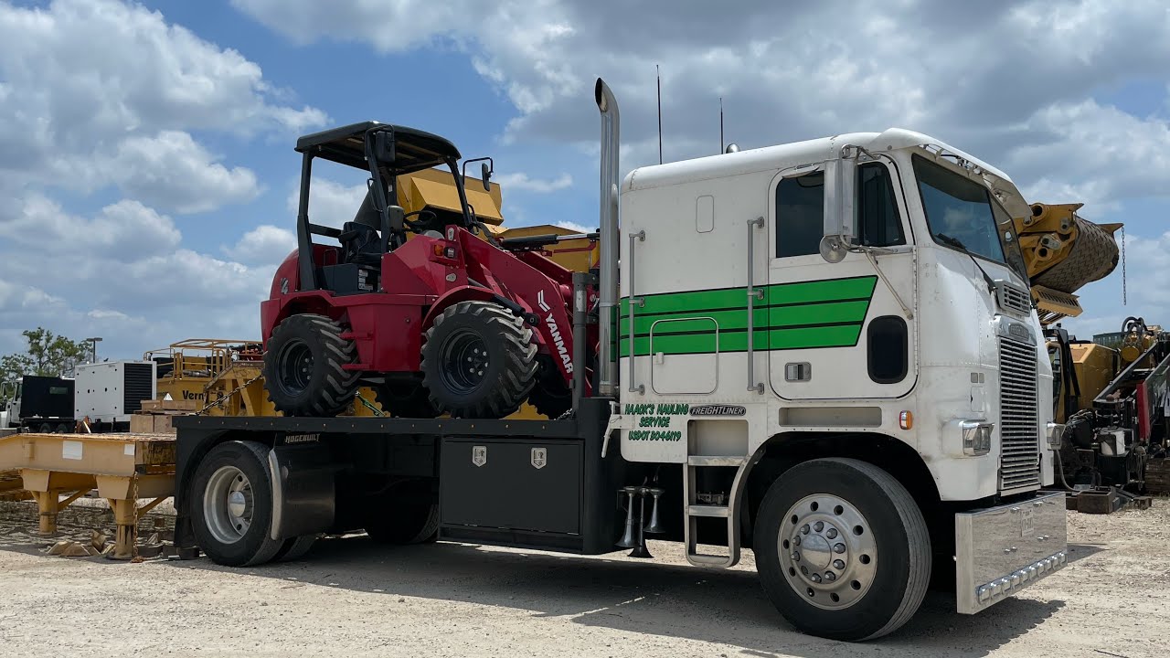 Cabover hauls a mini loader! - YouTube