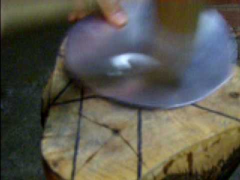 Shrinking Metal Using a Stump and a Wooden Mallet - YouTube