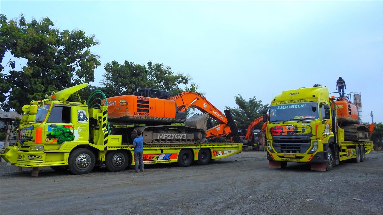 Hitachi Zaxis 200 Excavator Transport With Self Loader Trucks To The ...