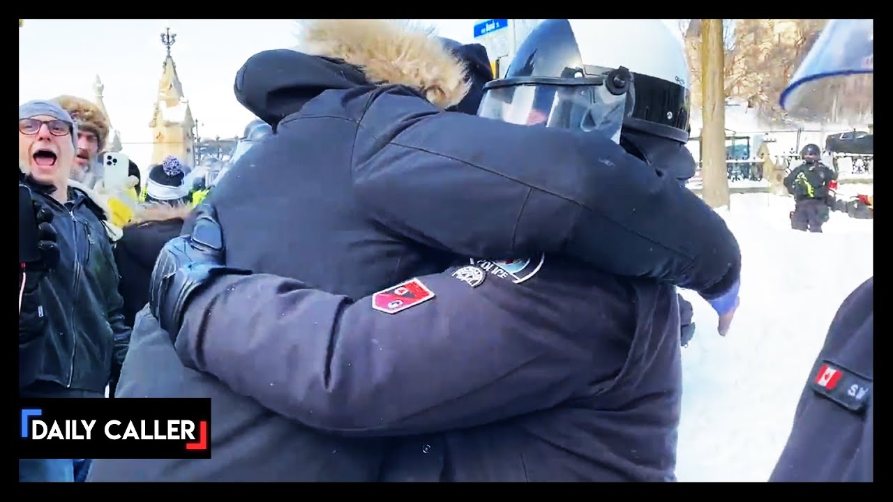 Toronto Police Officer Seen Hugging Protesters... Until He Seems To Be ...
