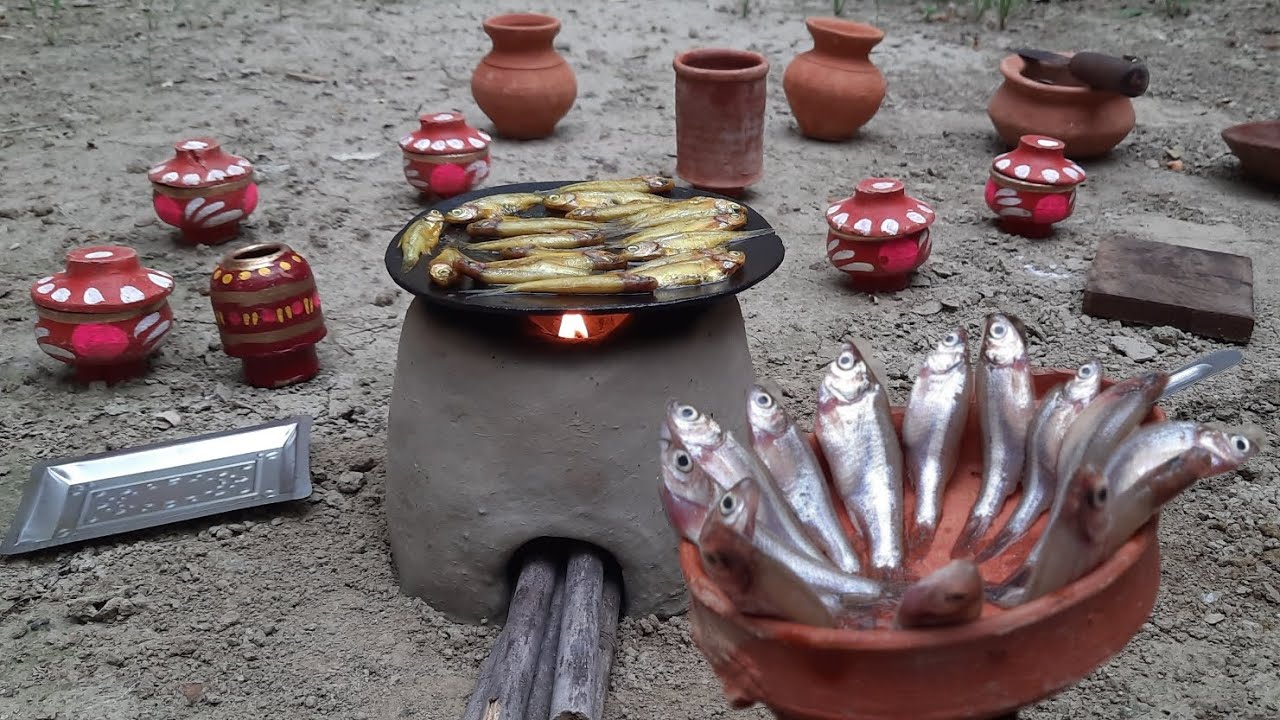We cooked fried fish from our pond in the mini kitchen - YouTube
