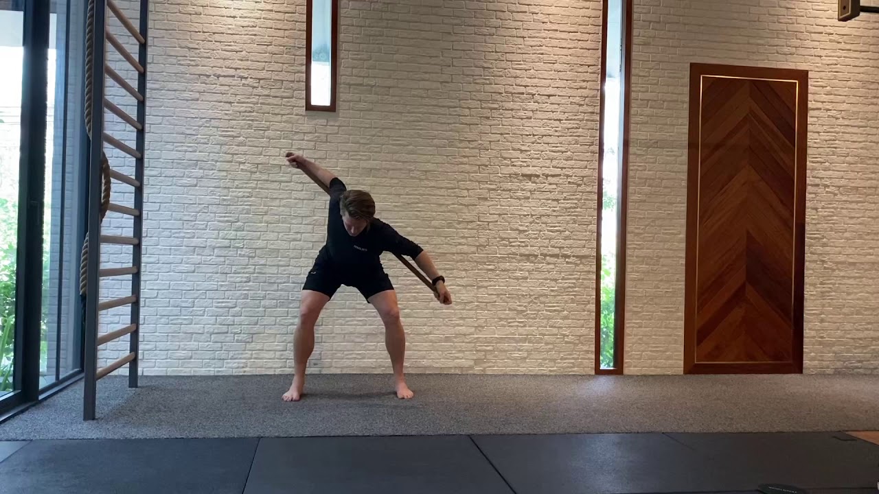Standing t-spine rotations, stick on back | Stick - YouTube