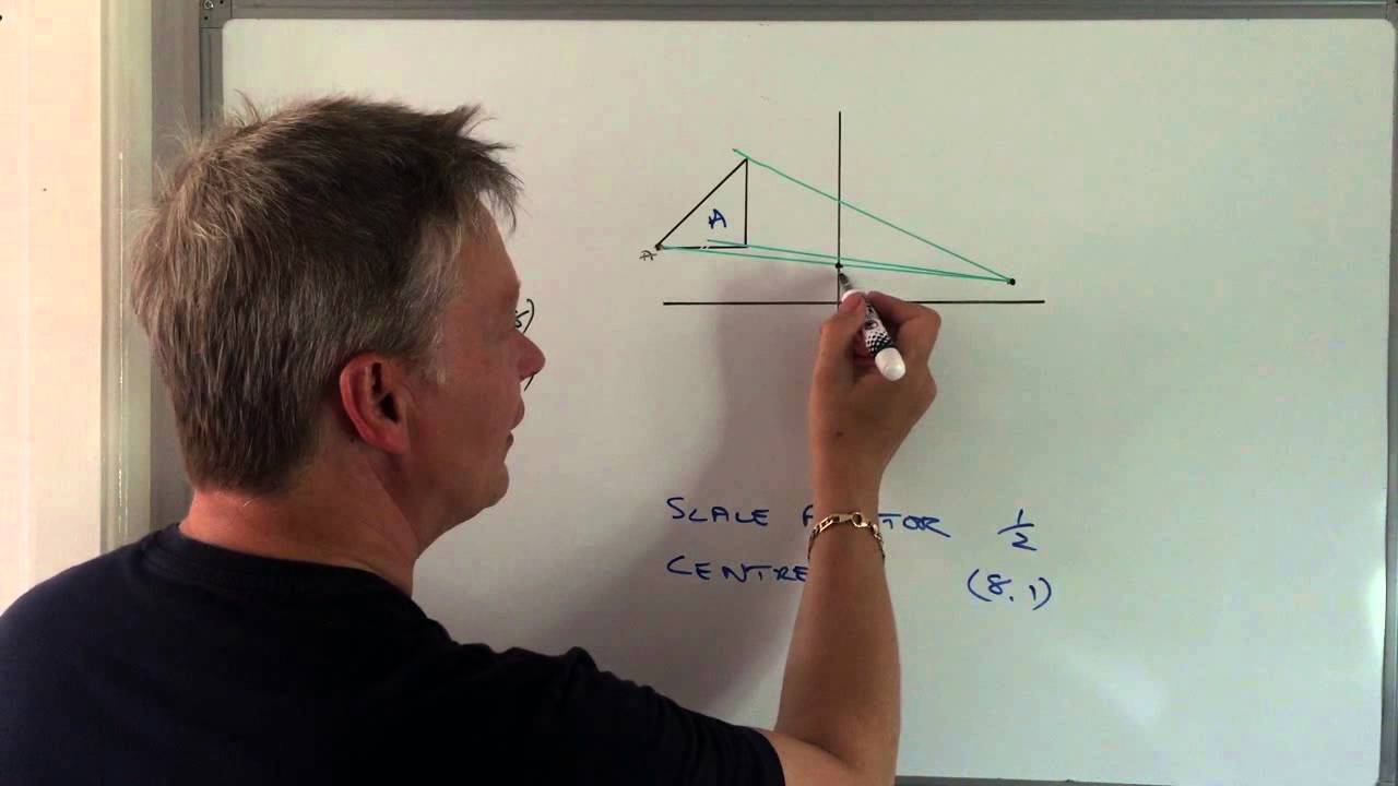 How to enlarge a shape by scale factor of a half - YouTube