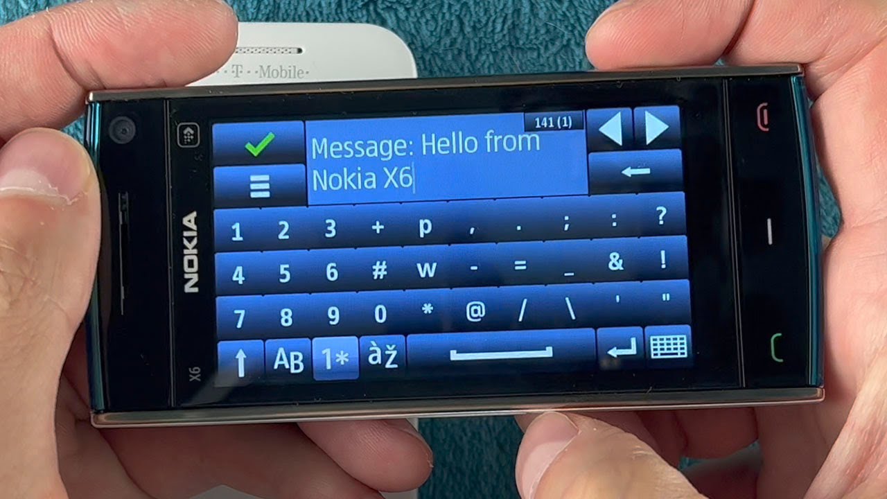 Sending SMS from Nokia X6 to HTC Dream G1 and back - YouTube
