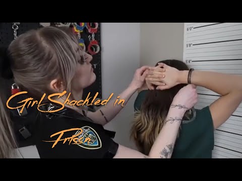 Girl Handcuffed and Shackled in Prison