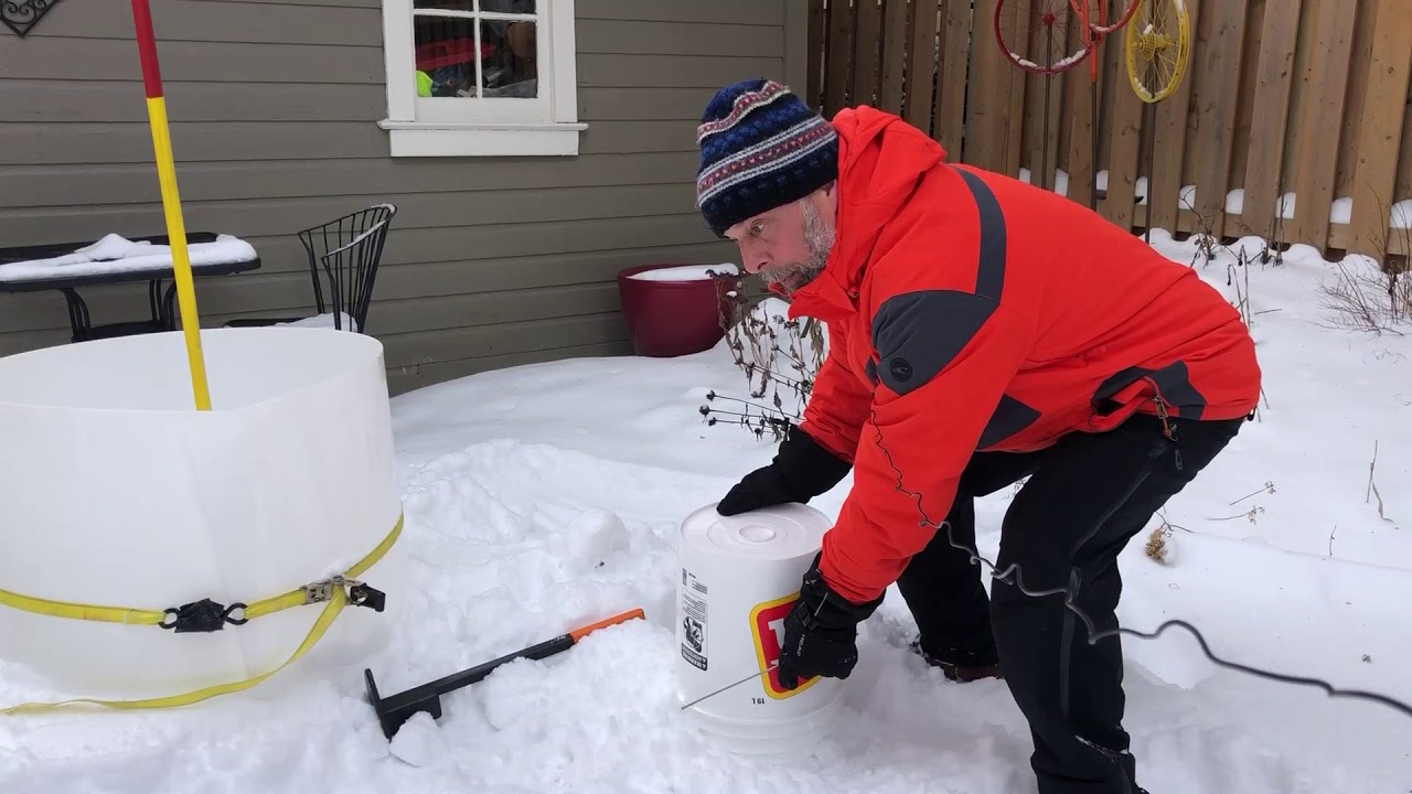 How to fill a pail with snow in preparation for snow sculpting. - YouTube