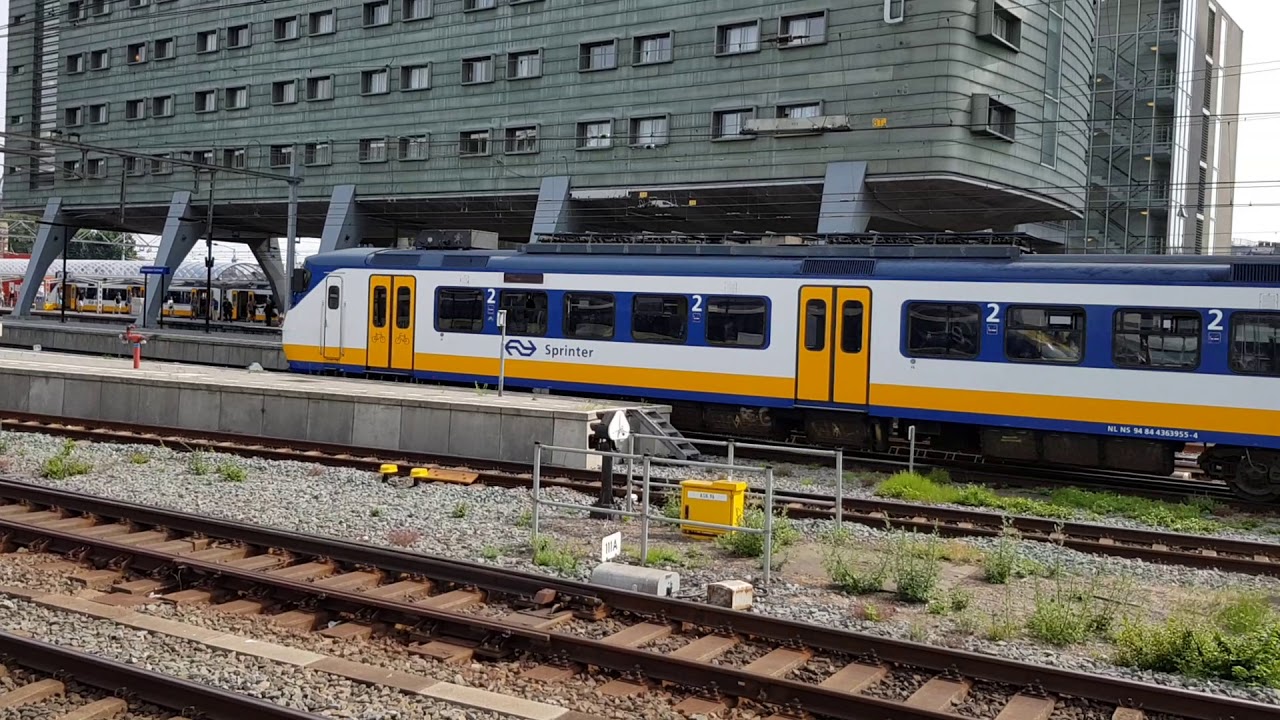 NS SGM 1/2 2957 departing from Amsterdam Central Station on 25/6/19 ...
