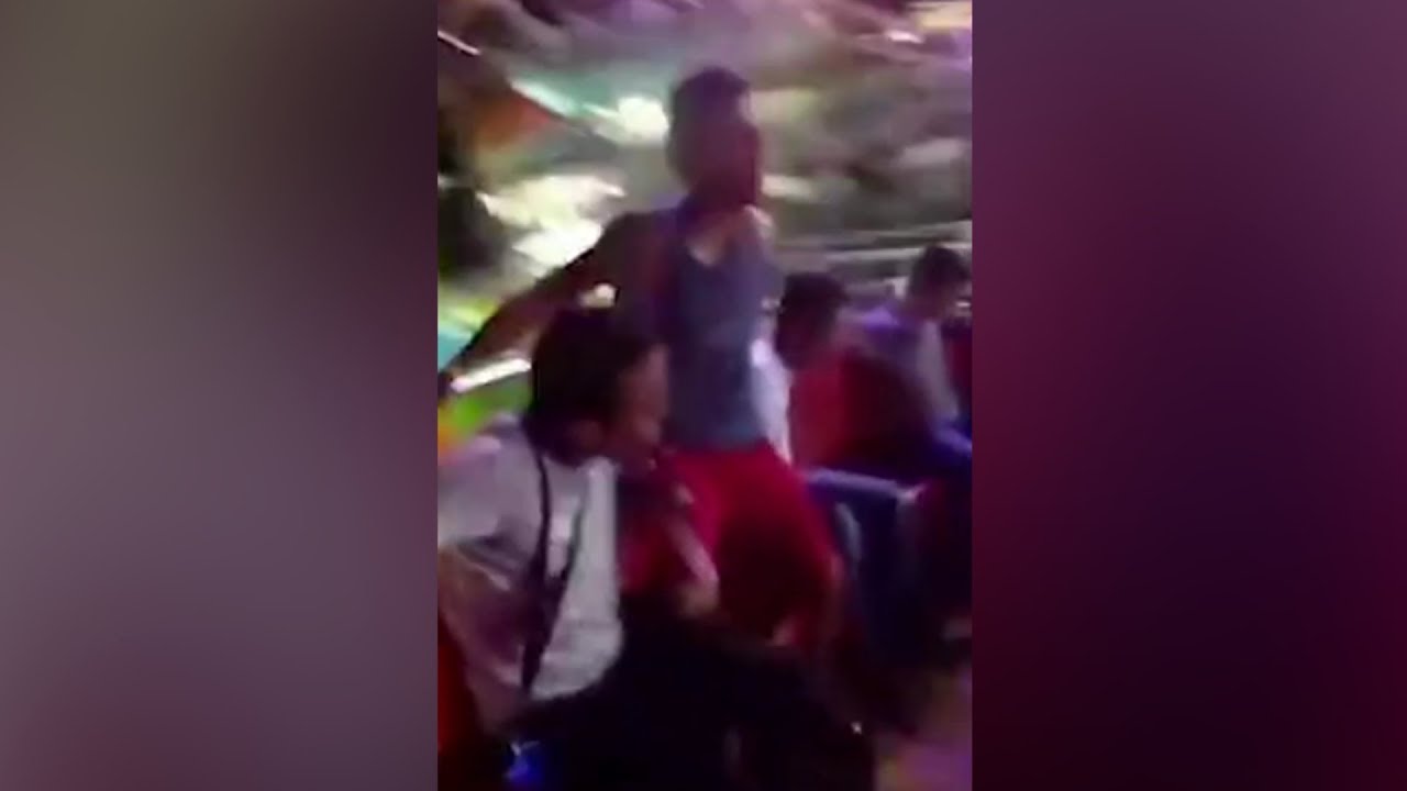 Teenager thrown off carnival ride - YouTube
