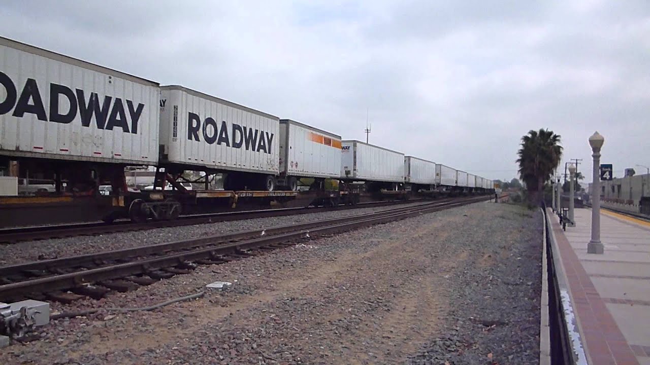 BNSF 5033 4550 5436 7363 and South bound Amtrak - YouTube