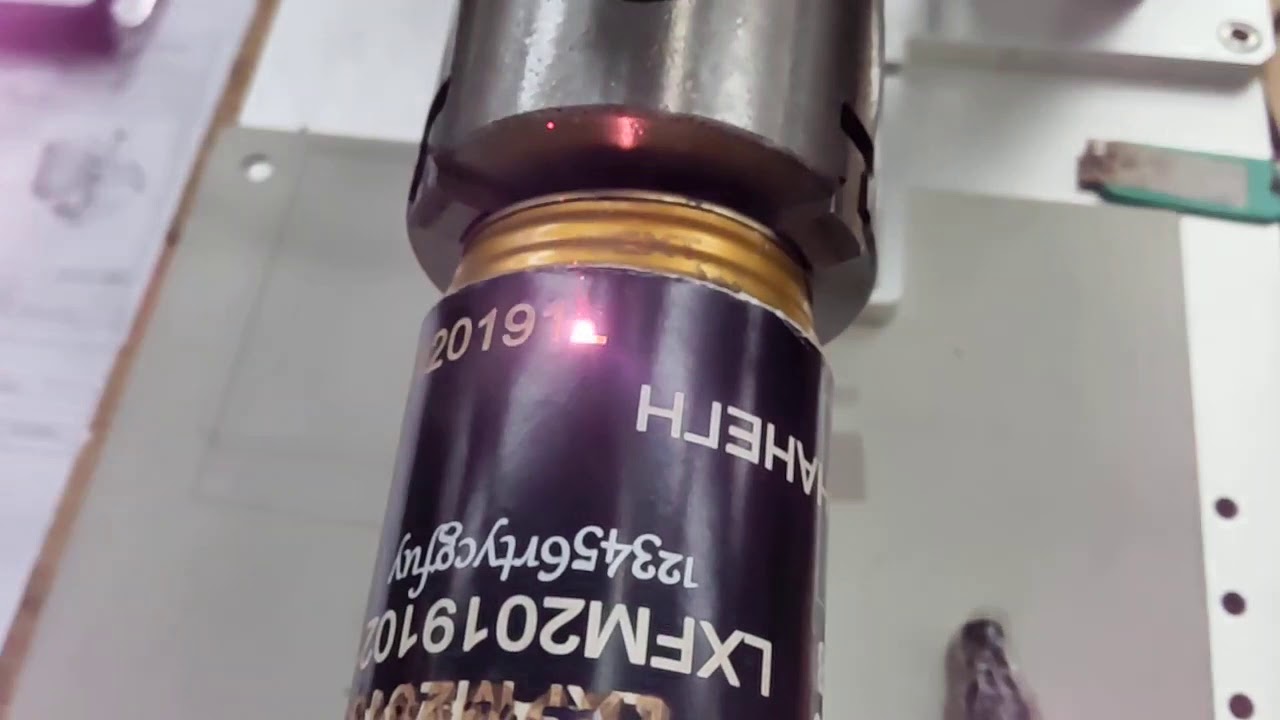 JNLINK portable handheld fiber laser marking machine working on rotary ...