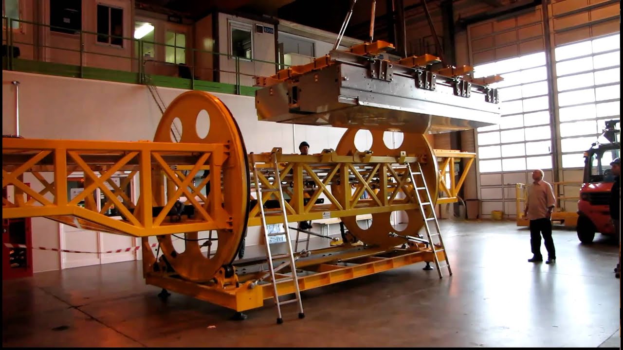 Loading an EMCAL SuperModule into the insertion tool - YouTube