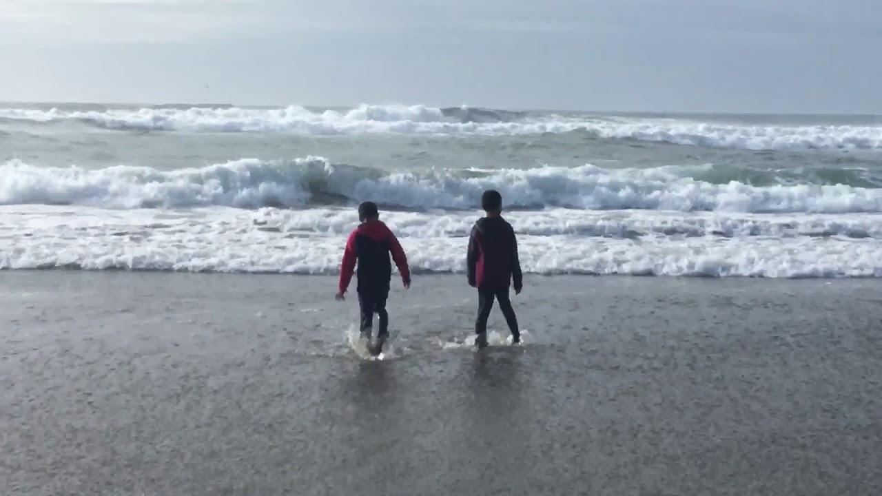 Running away from waves!!! - YouTube