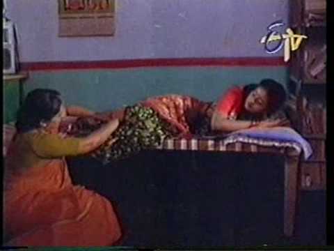 older woman servingAtHerFeet