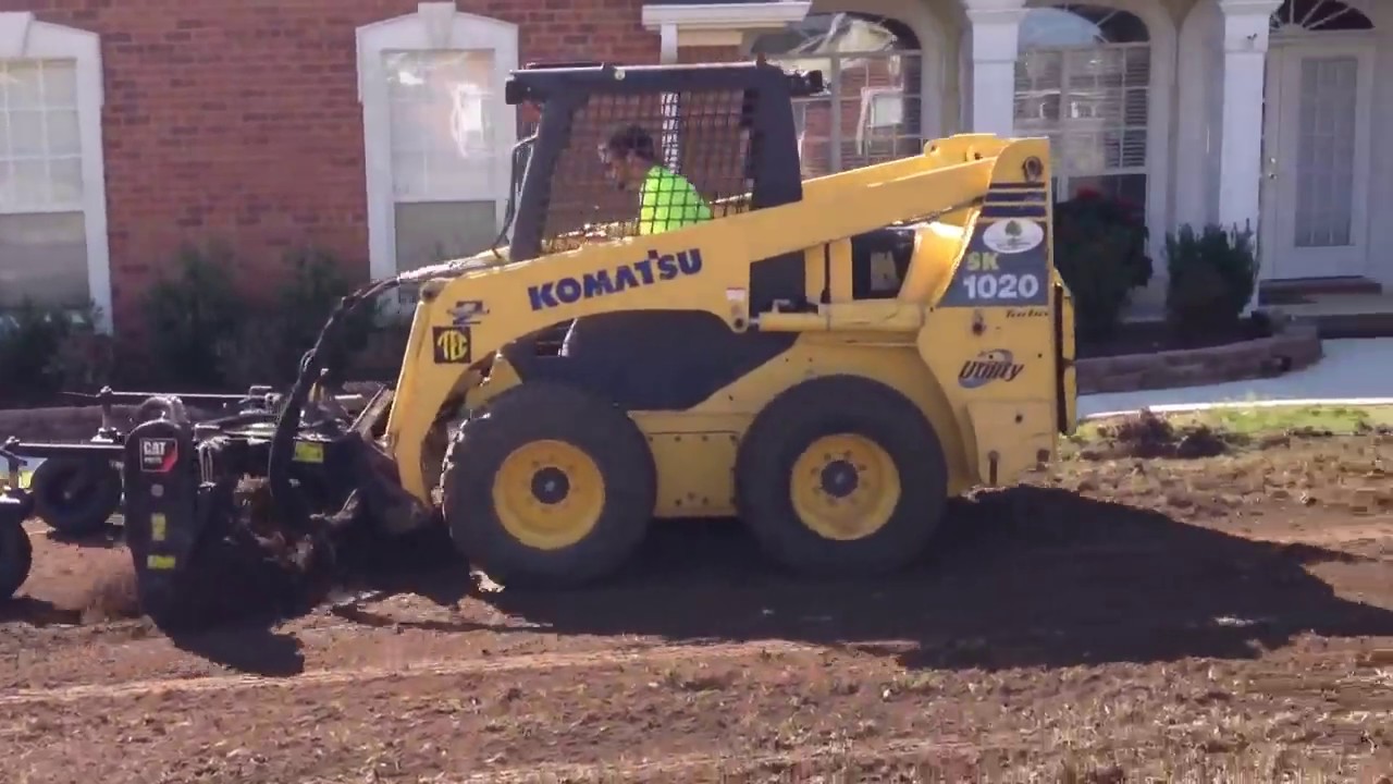 Grading with a Harley Rake - YouTube