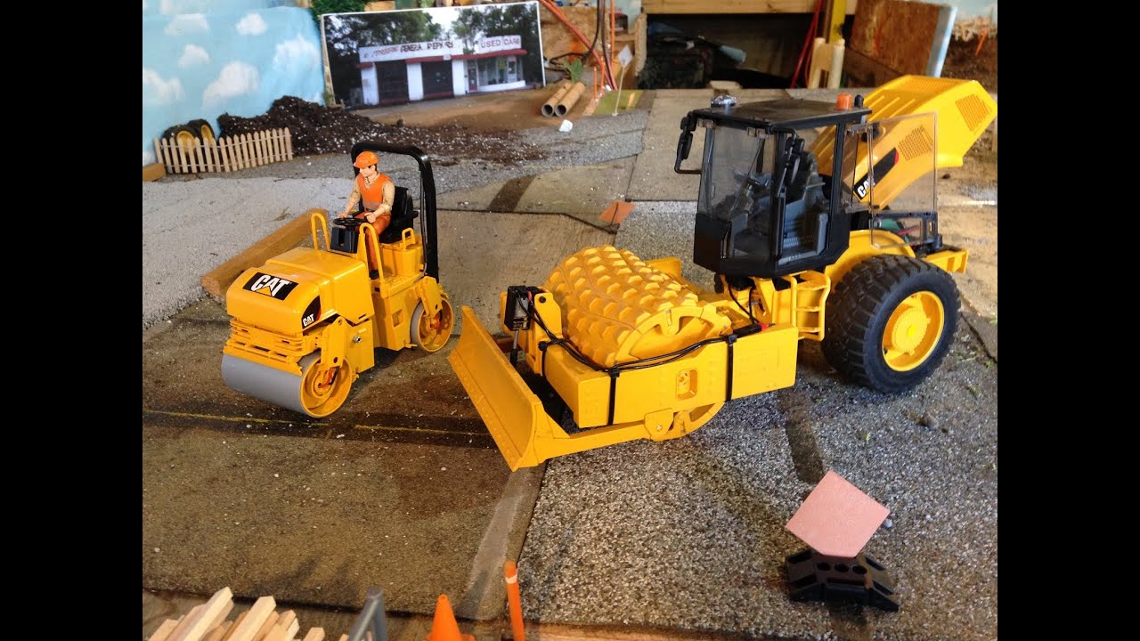 CAT RC COMPACTORS WORKING ON A ROAD. - YouTube