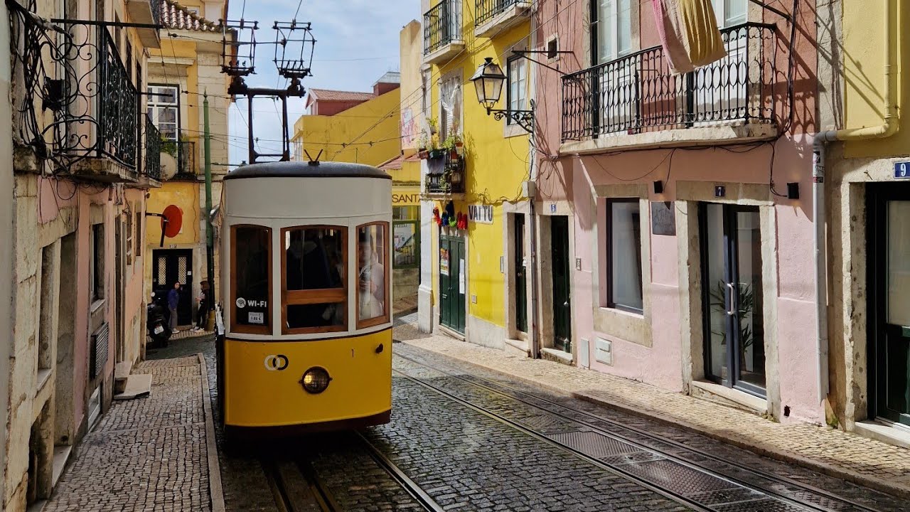 Lisbon - walking in the Rua da Bica de Duarte Belo street with the ...