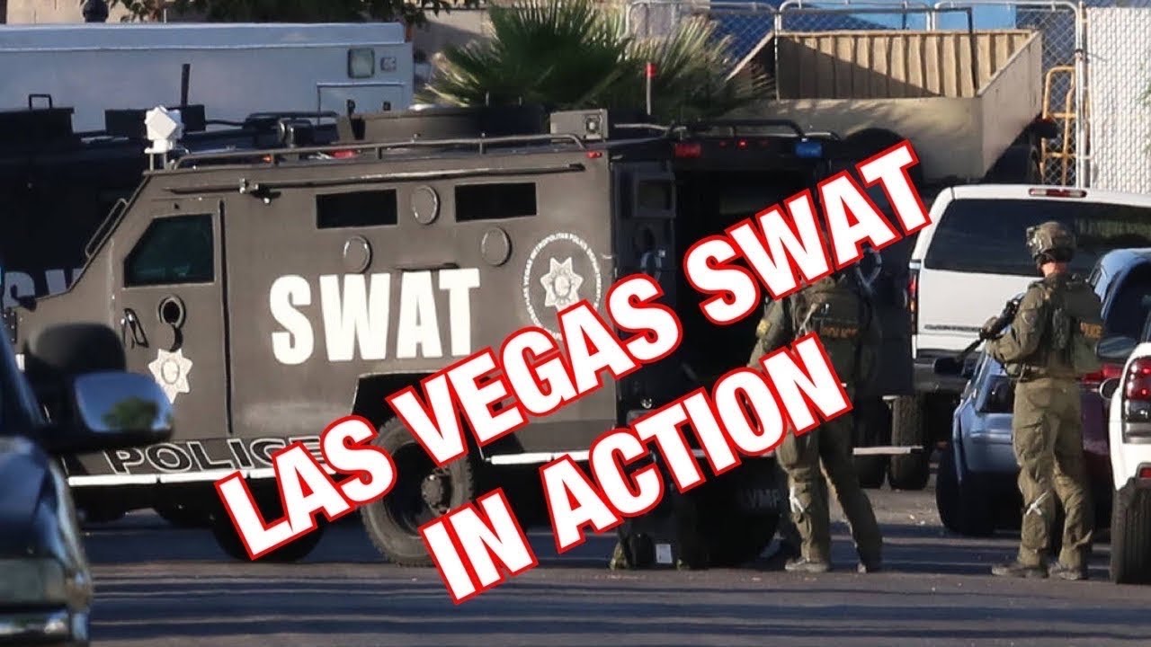 BARRICADED SUSPECT- SWAT TEAM, FLASH BANG AND AMORED VEHICLES ...