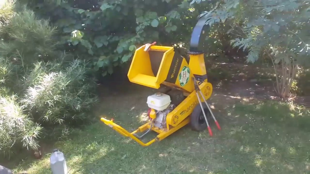 Crown lifting trees / pruning apple trees and chipping - YouTube