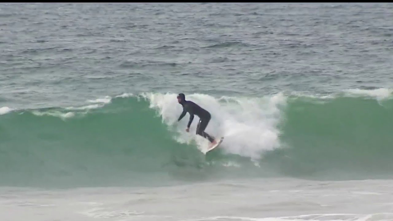 Surfers in Malibu prepare for huge waves - YouTube