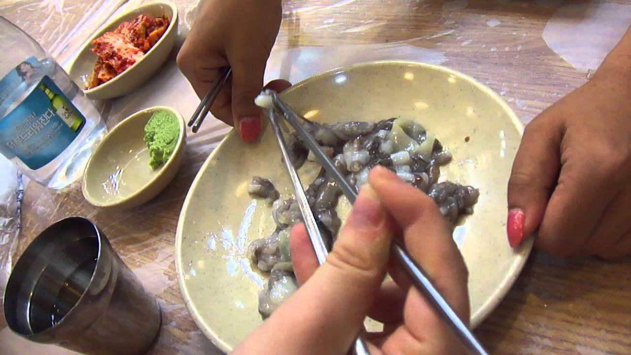 Eating a moving octopus - YouTube