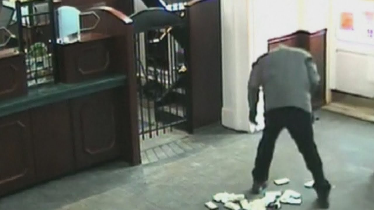 Bank Robbery Fail Suspect Drops Thousands Of Dollars In Bank And Gets bank-robbery-fail-suspect-drops-thousands-of-dollars-in-bank-and-gets