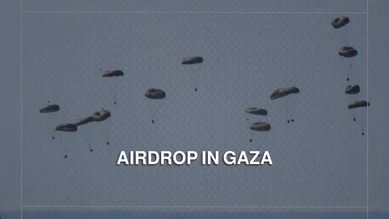 Humanitarian aid parachuted into the Gaza Strip via airdrop - YouTube