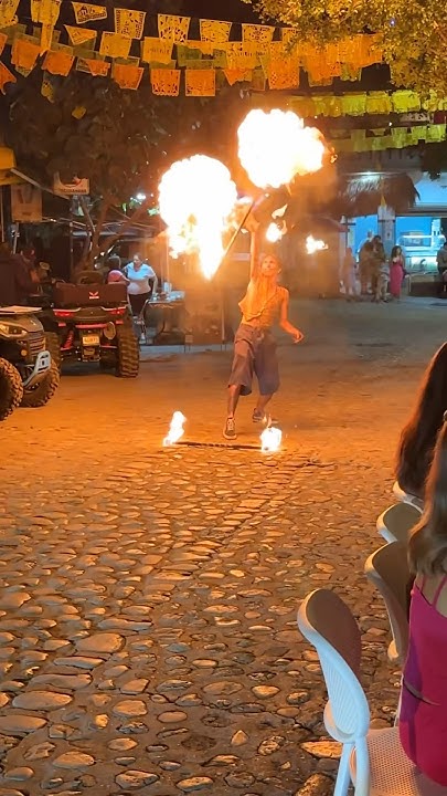 Street performer juggles sticks of fire! #subscribetomyyoutubechannel #mexico #travelvlog # ...